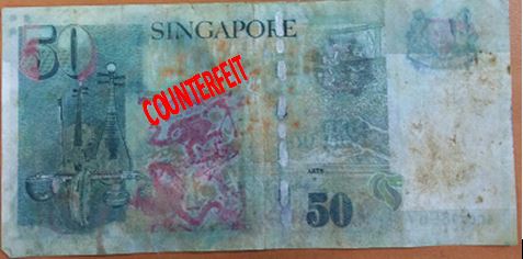 Arrested: Man behind the counterfeit $50 notes spreading around Hougang ...