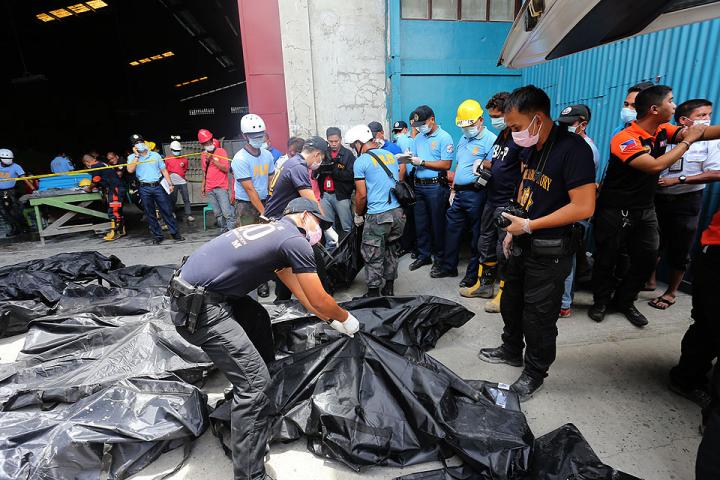 Philippine factory fire kills 72, barred windows blamed | Coconuts