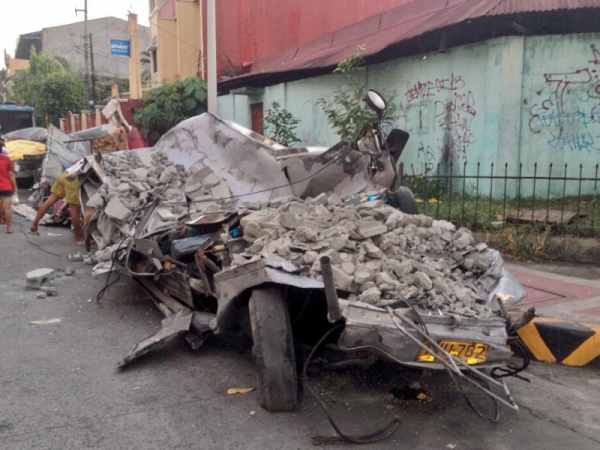 Warehouse wall collapses in Barangay Masambong, QC | Coconuts