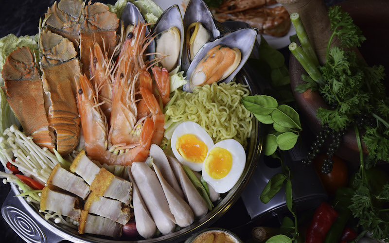 Get steamy with this new restaurant's tom yum broth Thai hot pot | Coconuts