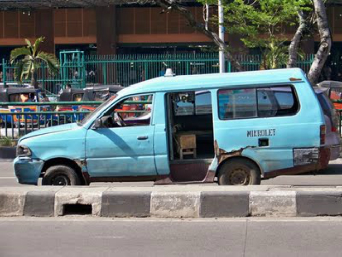 Angkot minivan drivers refuse to lower fares despite decrease in fuel ...