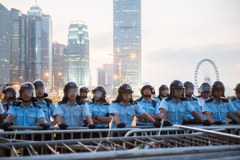 The Hong Kong Police Force produces videos to show how "courageous" and ...