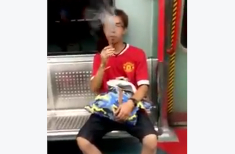 ‘What the hell does it have to do with you?!’: Video of man smoking on ...