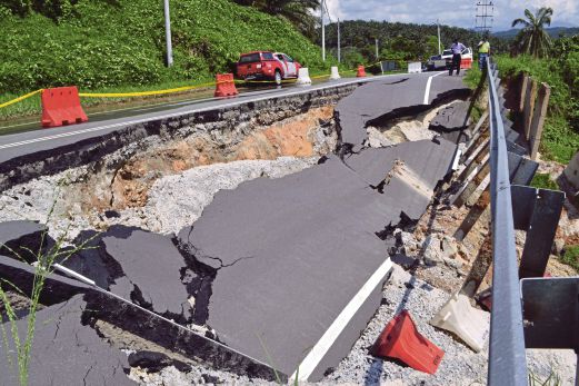 34m stretch of road collapses in Slim River | Coconuts