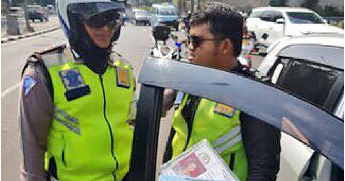 Fake policeman soliciting bribes from motorists caught red-handed by ...