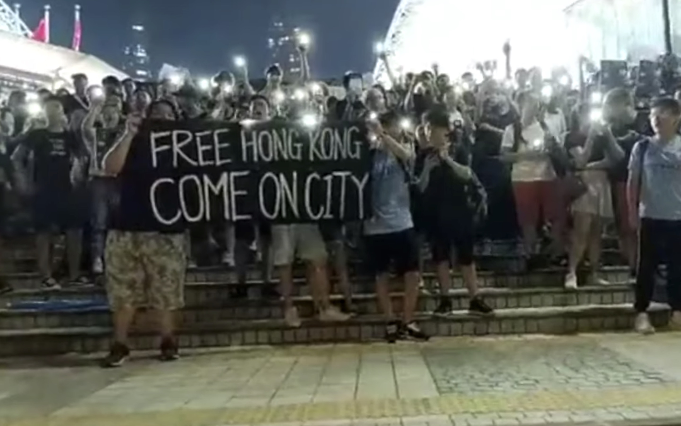 'Do You Hear The People Sing?' Kinda: Soccer fans chant slogans, sing ...