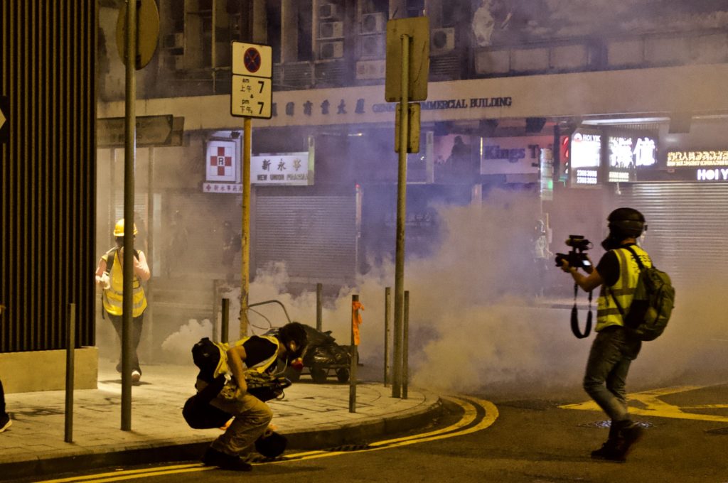Jokers, Yodas, and Trumps met with tear gas at Halloween rally | Coconuts