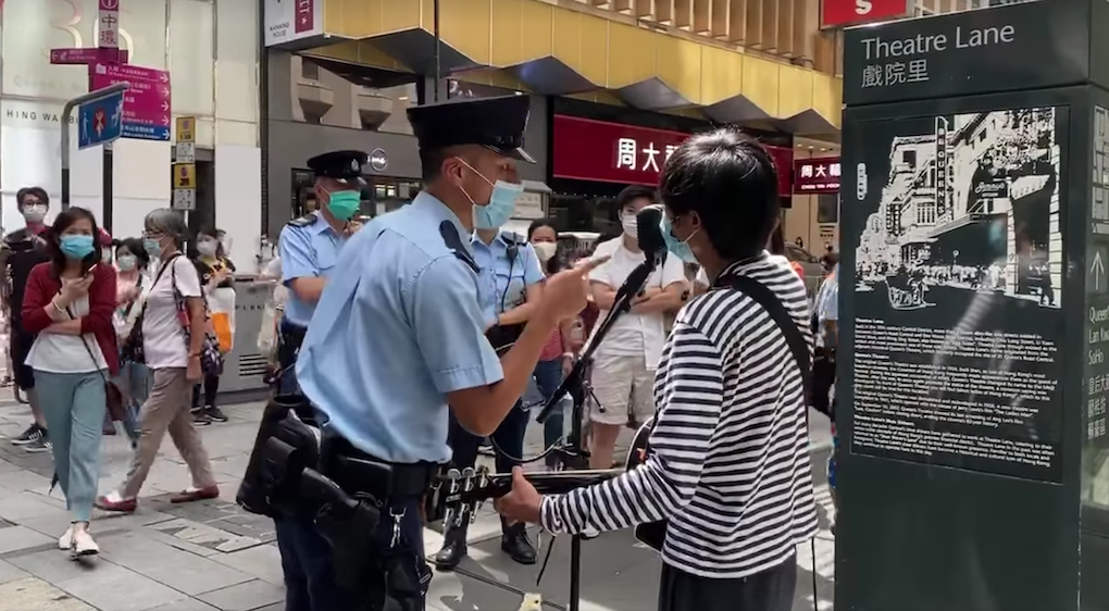 Arrested twice and facing a dubious weapons charge, 'Glory to Hong Kong ...