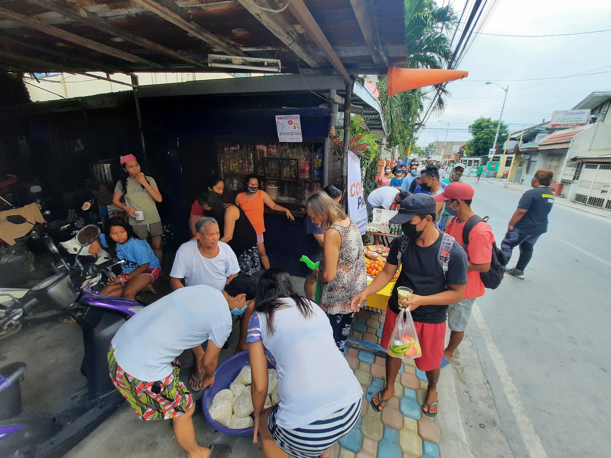 Community pantry organizers urged to find safer way to give food to ...