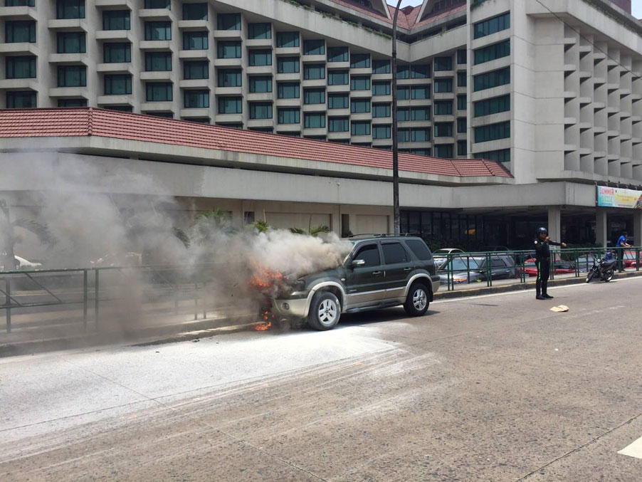 SUV catches fire along EDSA | Coconuts
