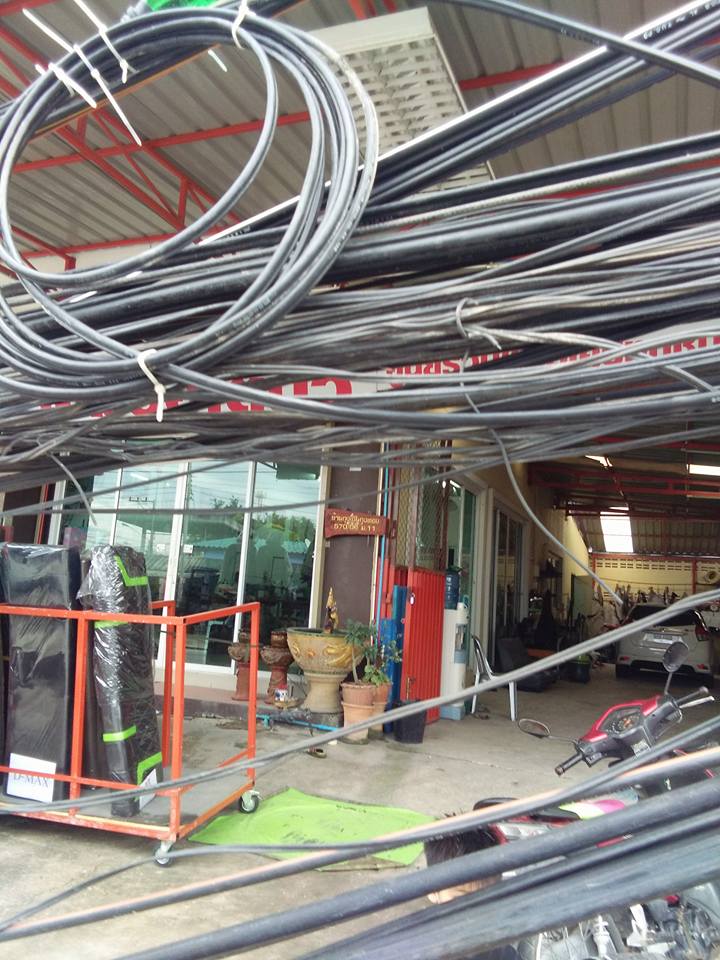 World of Wires: Man’s shop front hidden by so many wires that no ...